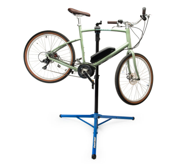How to Safely Put Bicycles in Clamping Repair Stands